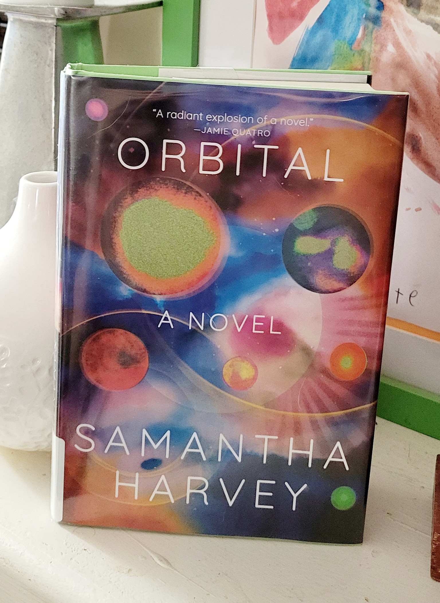 ORBITAL – Samantha Harvey – A Girl Named Tommi